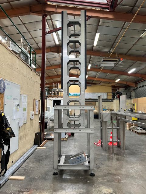 Convoyeur vertical à bras - Validex